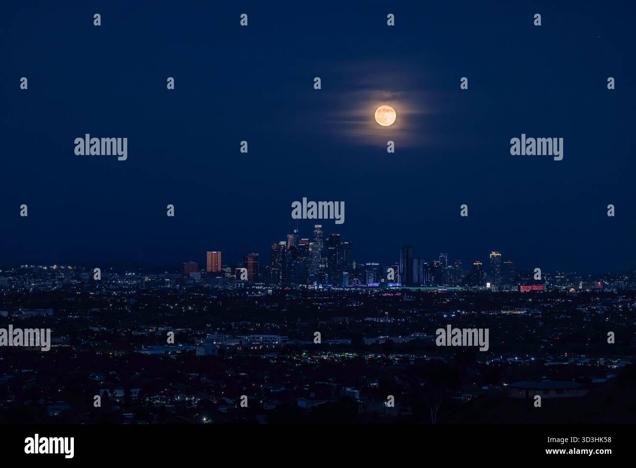 A full super moon, named the Beaver Moon, rises abpove downtown Ls ...