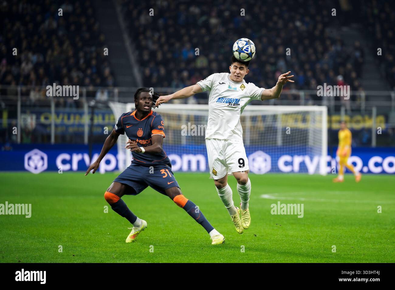 Dastan Satpayev of FC Kairat Almaty competes for the ball wiht Yann ...