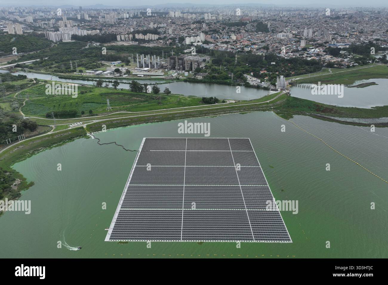A solar photovoltaic plant floats on the water at the Billings ...