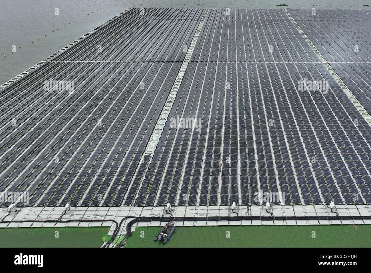 A solar photovoltaic plant floats on the water at the Billings ...