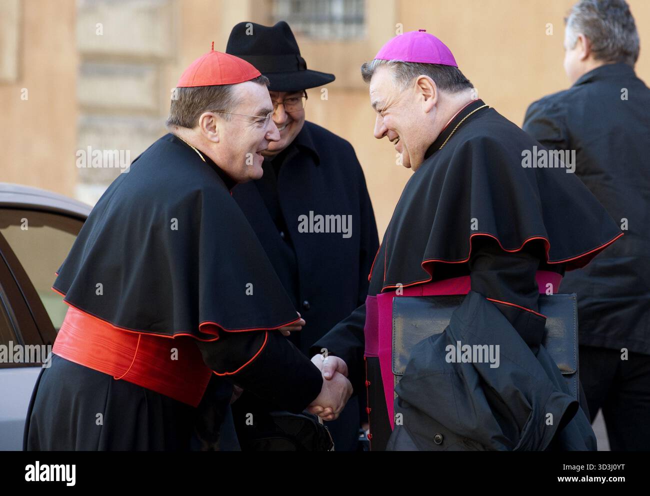 **NO LIBRI** Feb. 17,2012: Prague Archbishop Dominik Duka (R) shakes ...