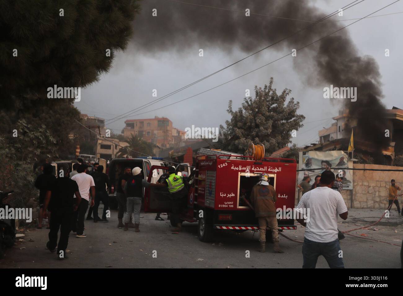 Smoke rises following an Israeli airstrike in the village of Teir Debba ...