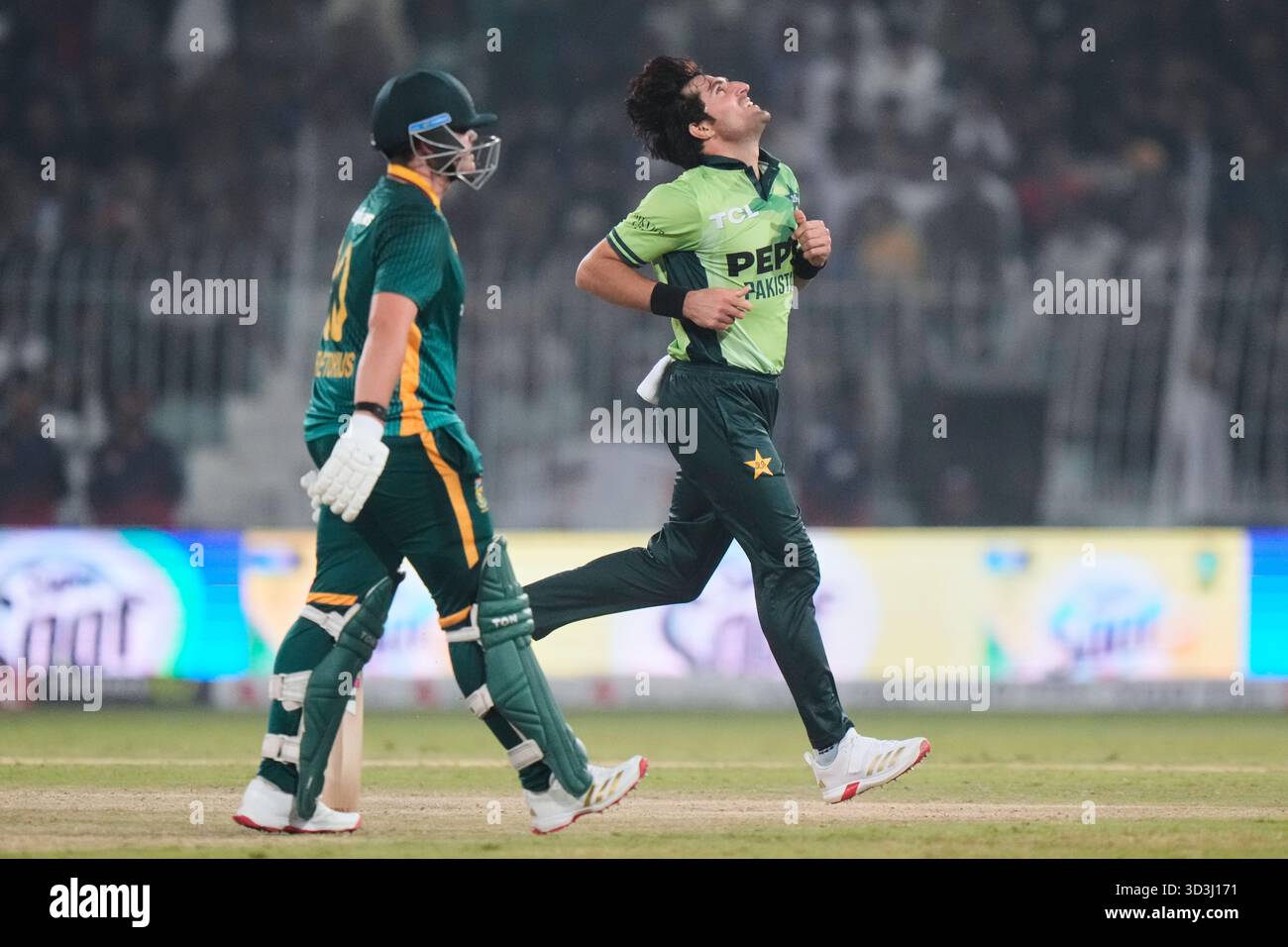 Pakistan's Mohammad Wasim, right, celebrates after taking the wicket of ...