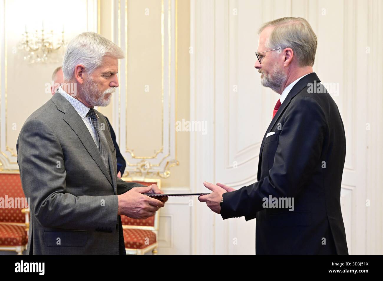 Czech President Petr Pavel, left, accepted the resignation of Czech ...