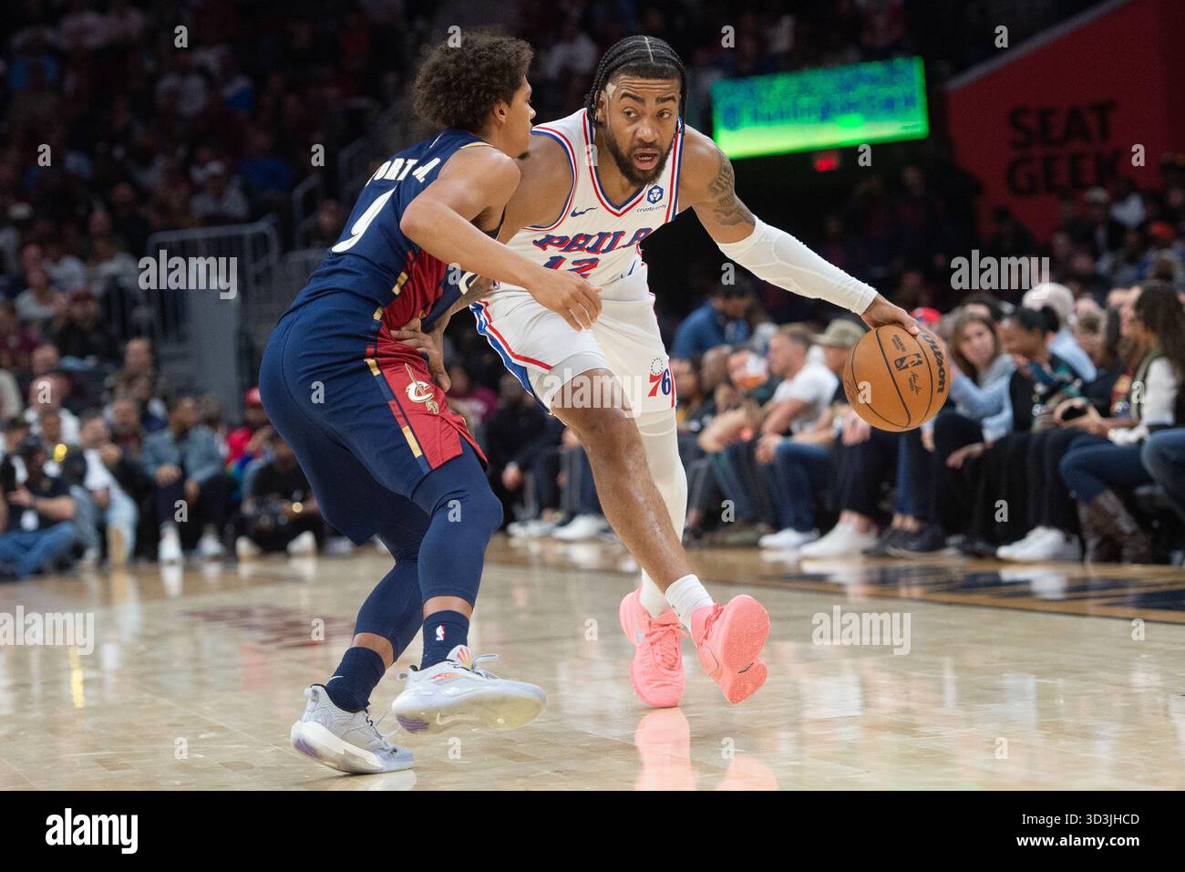 Cleveland Cavaliers' Craig Porter Jr., left, guards Philadelphia 76ers ...
