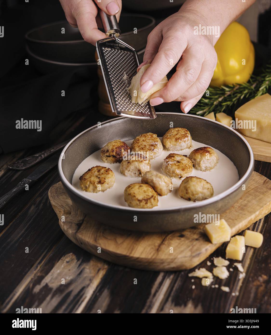 Woman parmesan cheese in hi-res stock photography and images - Alamy