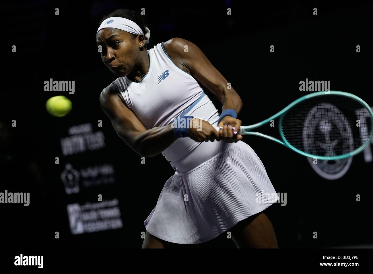 Coco Gauff of the United States plays a backhand return to Aryna ...