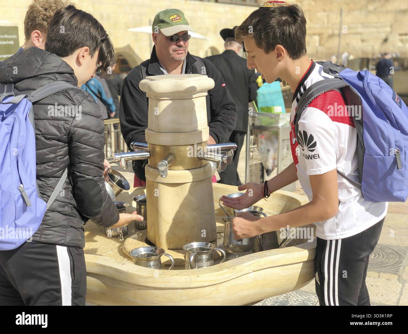 Cranes with water and special ritual Cups for washing hands beside the ...
