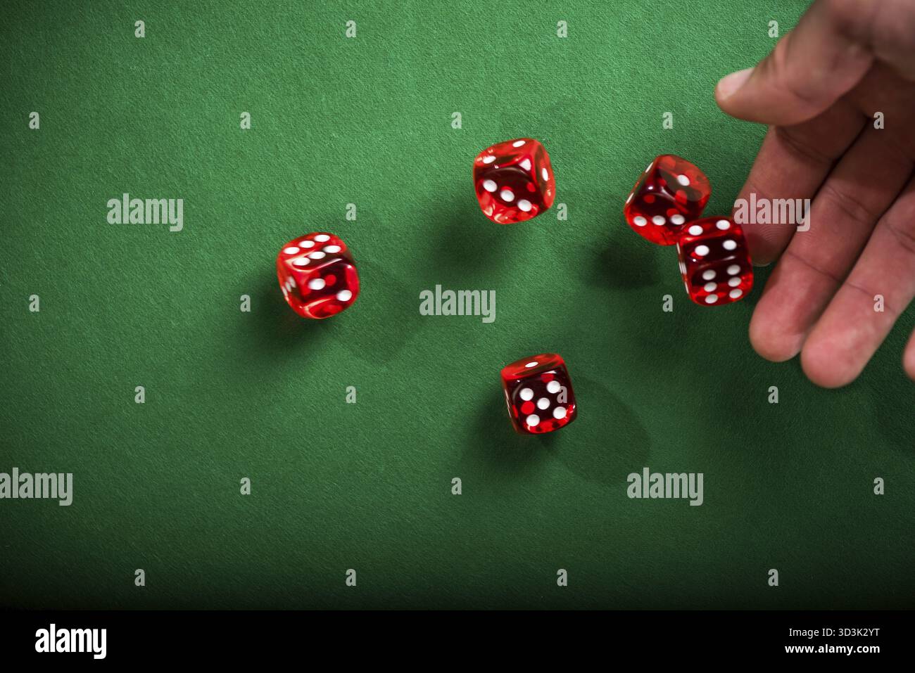 Red dice in hand hi-res stock photography and images - Alamy
