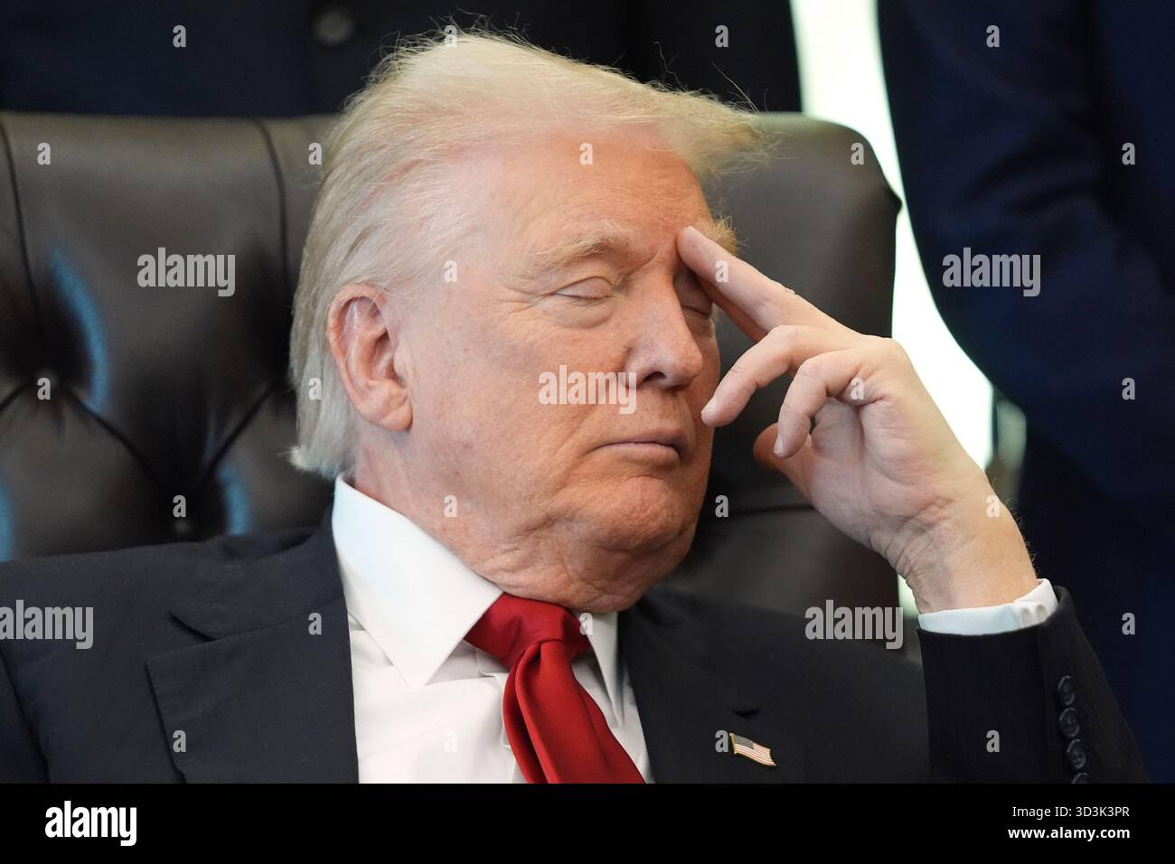 President Donald Trump listens as Health and Human Services Secretary ...