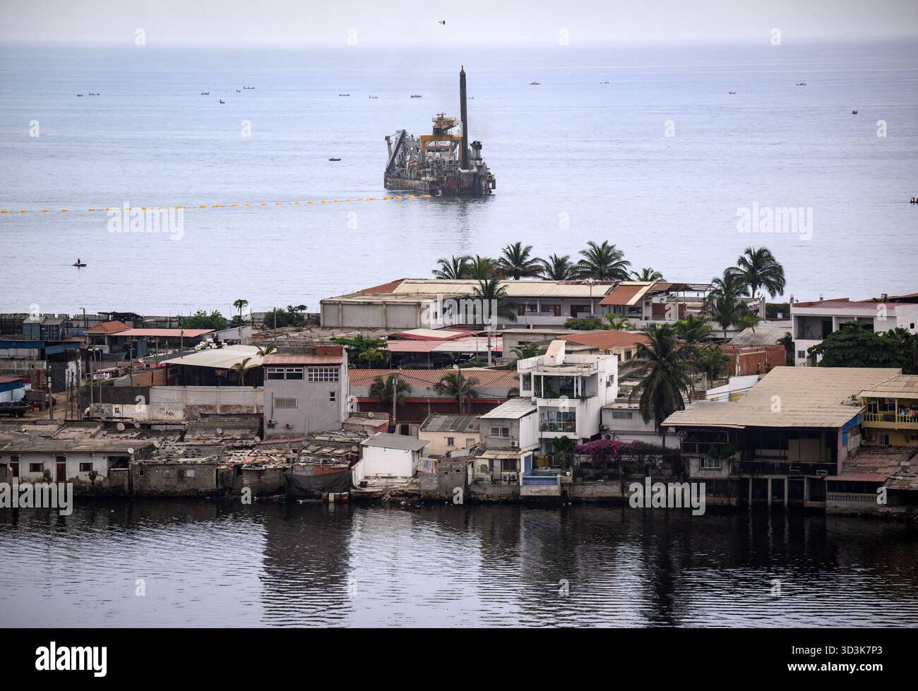 05 November 2025, Angola, Luanda: Houses of various designs stand near the port of Luanda ...
