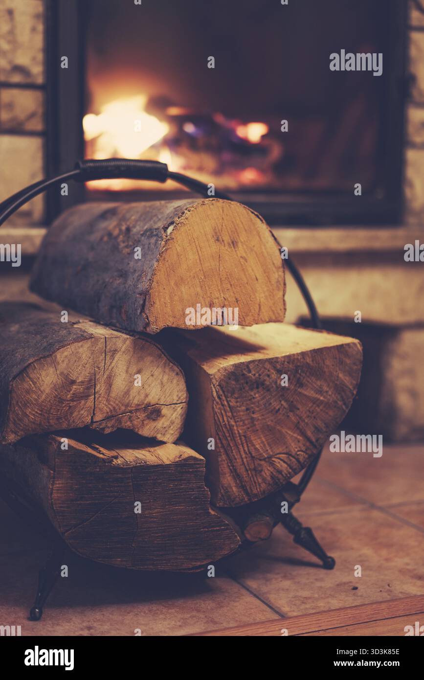 Small pile of firewood stacked next to the fire place at home Stock ...