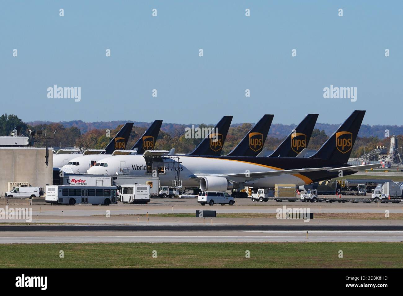 UPS jets are parked at the Worldport package sorting complex at ...