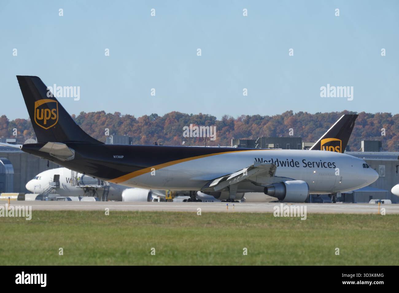 UPS jets are parked at the Worldport package sorting complex at ...