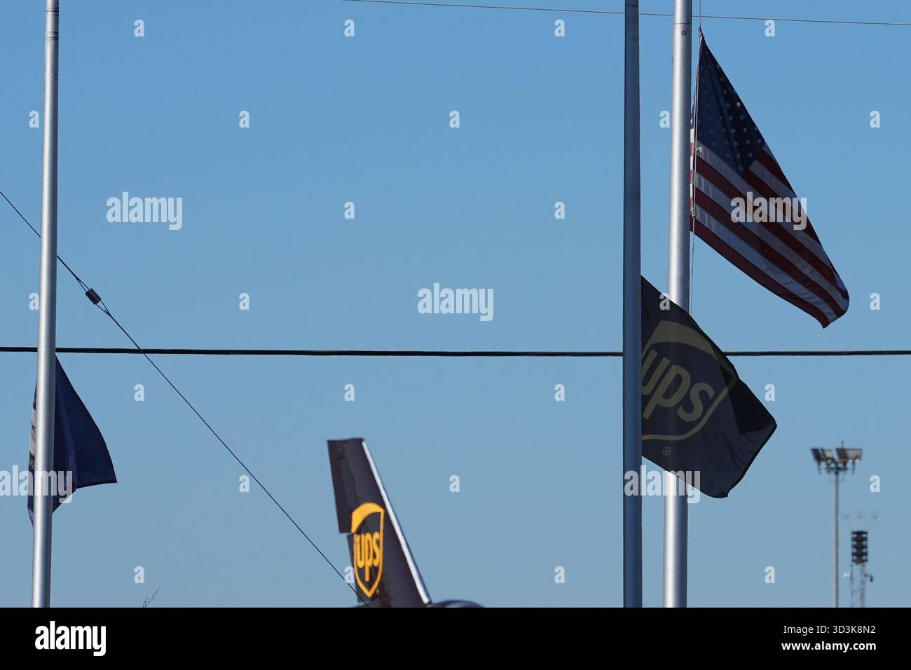 Flags fly at half-staff at the UPS Worldport at Louisville Muhammad Ali ...