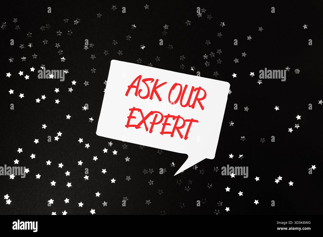 White and red sign that says Ask Our Expert is on a black background ...