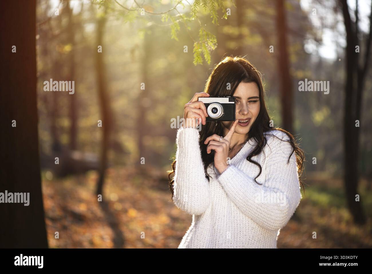Woman old camera in hi-res stock photography and images - Alamy