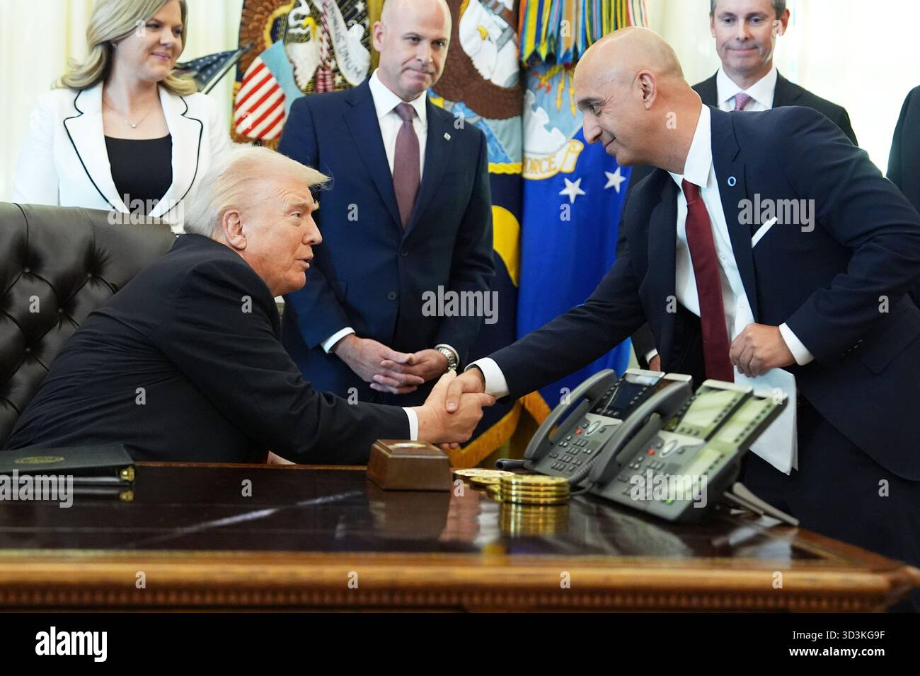 President Donald Trump, left, shakes the hand of Novo Nordisk President ...