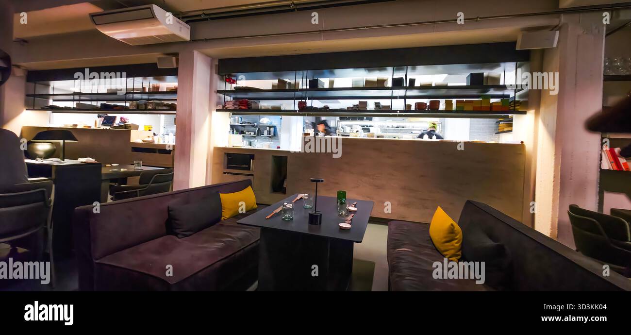 Berlin, Germany - August 07, 2025: Modern restaurant features cozy ...
