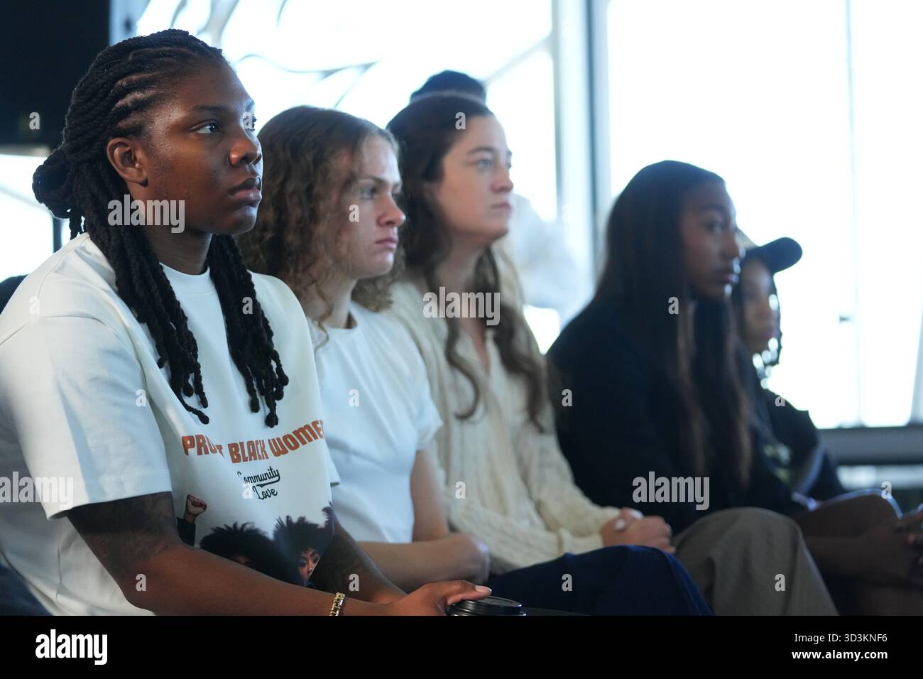 Dallas Wings players, from left, Myisha Hines-Allen, Grace Berger ...