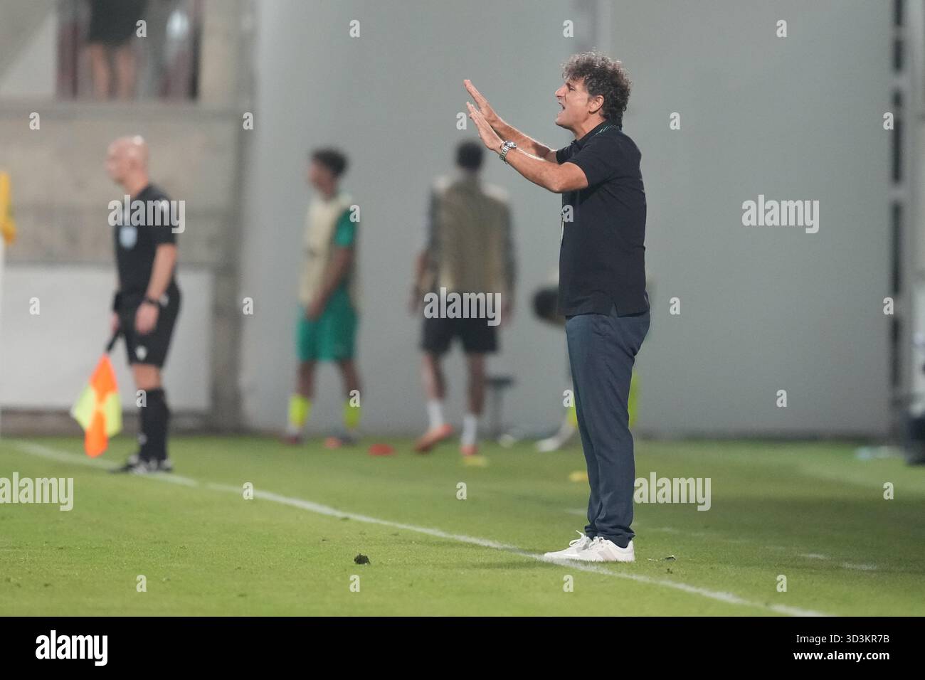AEK's head coach Imanol Idiakez gives directions to his players during ...