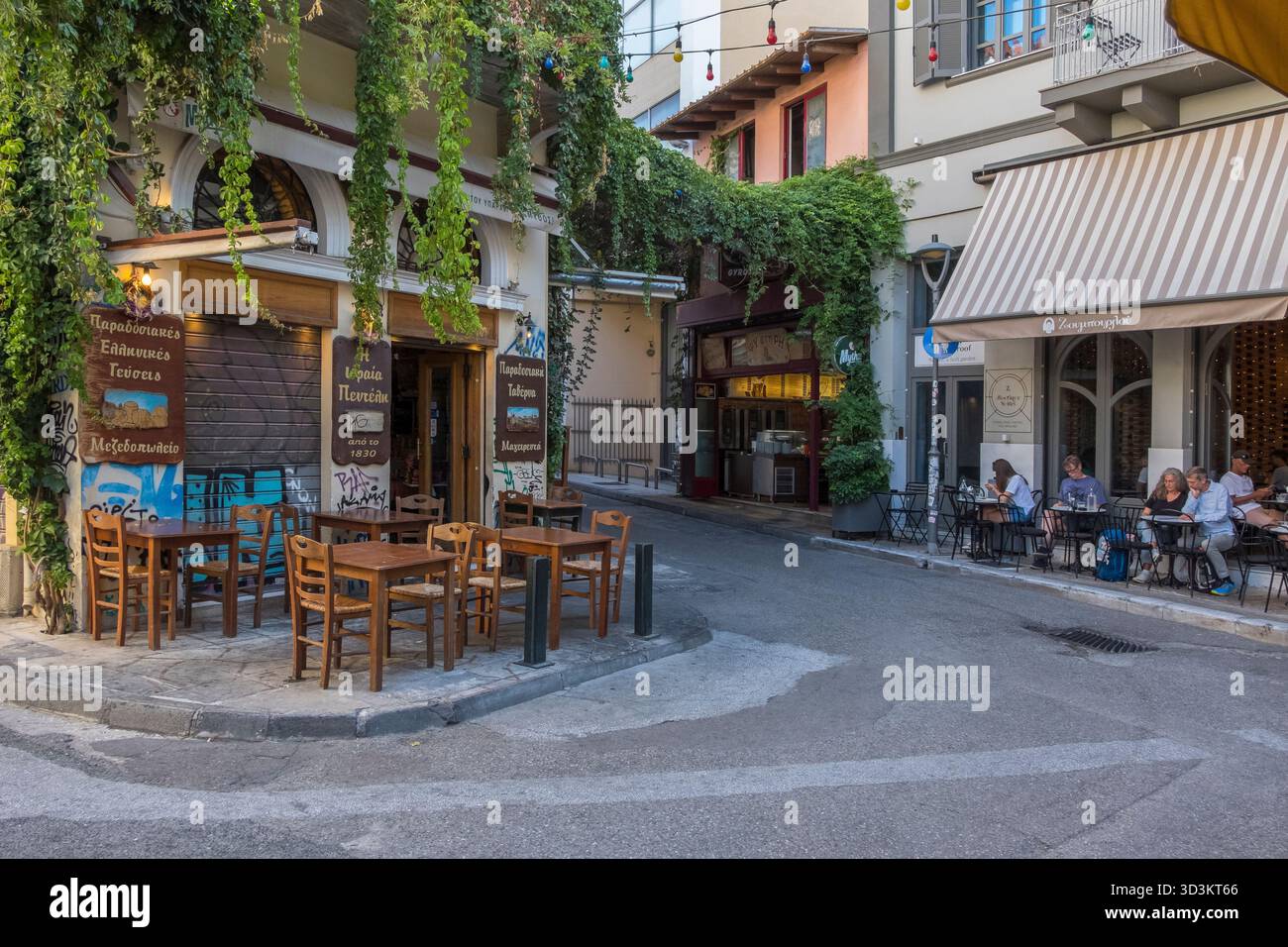 Terraces of bars and restaurants in the Psirri neighborhood of Athens ...