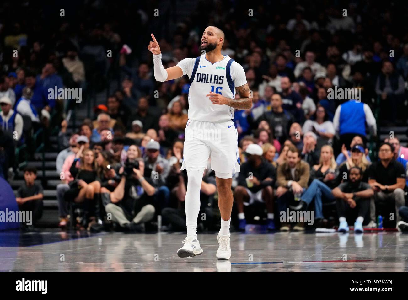 Dallas Mavericks' Caleb Martin talks to the bench during an NBA ...