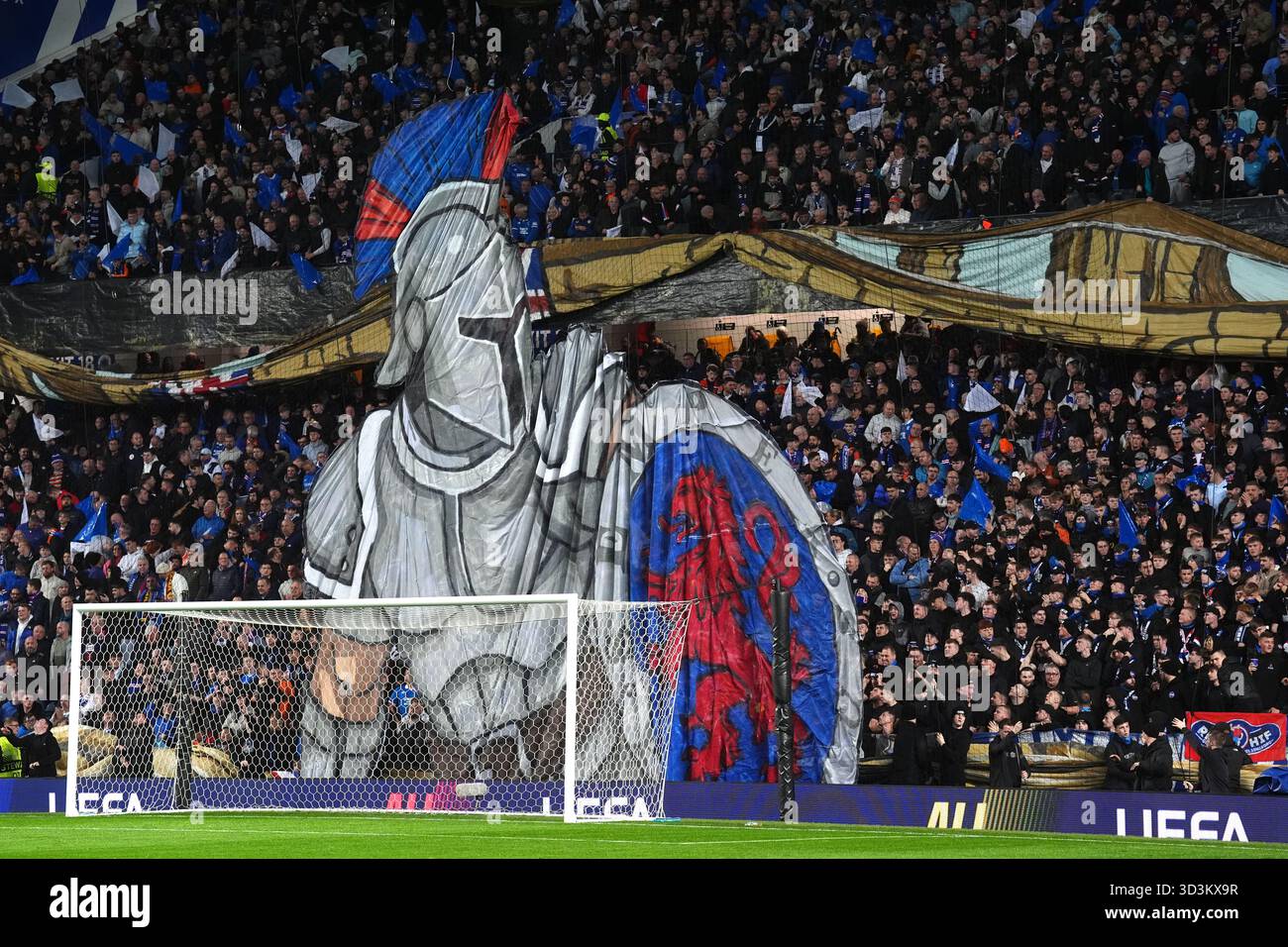 Rangers fans in the stands hold up a knight tifo ahead of the UEFA ...