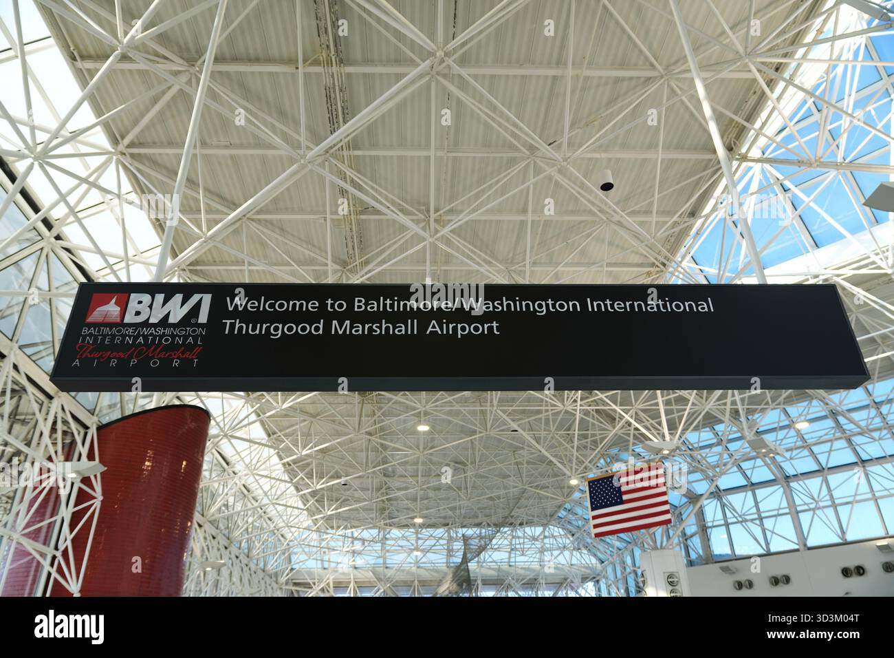A welcome sign is displayed in the terminal at Baltimore/Washington ...