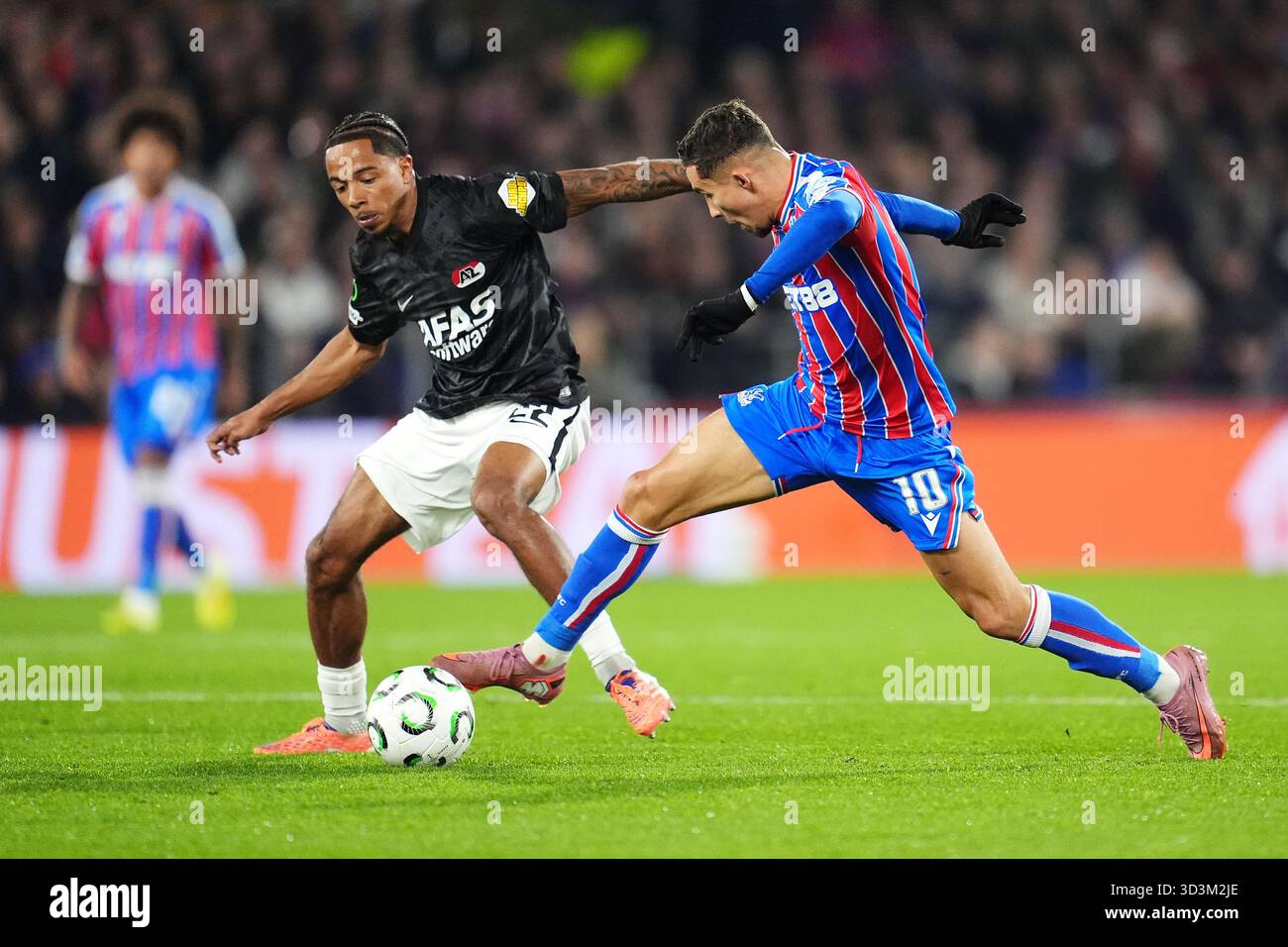 AZ Alkmaar's Elijah Dijkstra (left) and Crystal Palace's Yeremi Pino ...