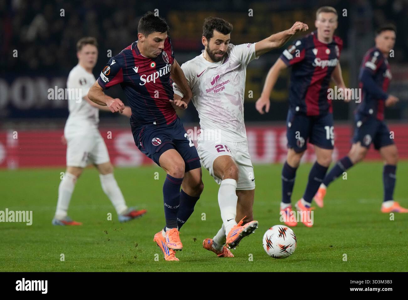 Bologna's Nicolo Cambiaghi, left, and Brann's Velte Dragsnes fight for ...