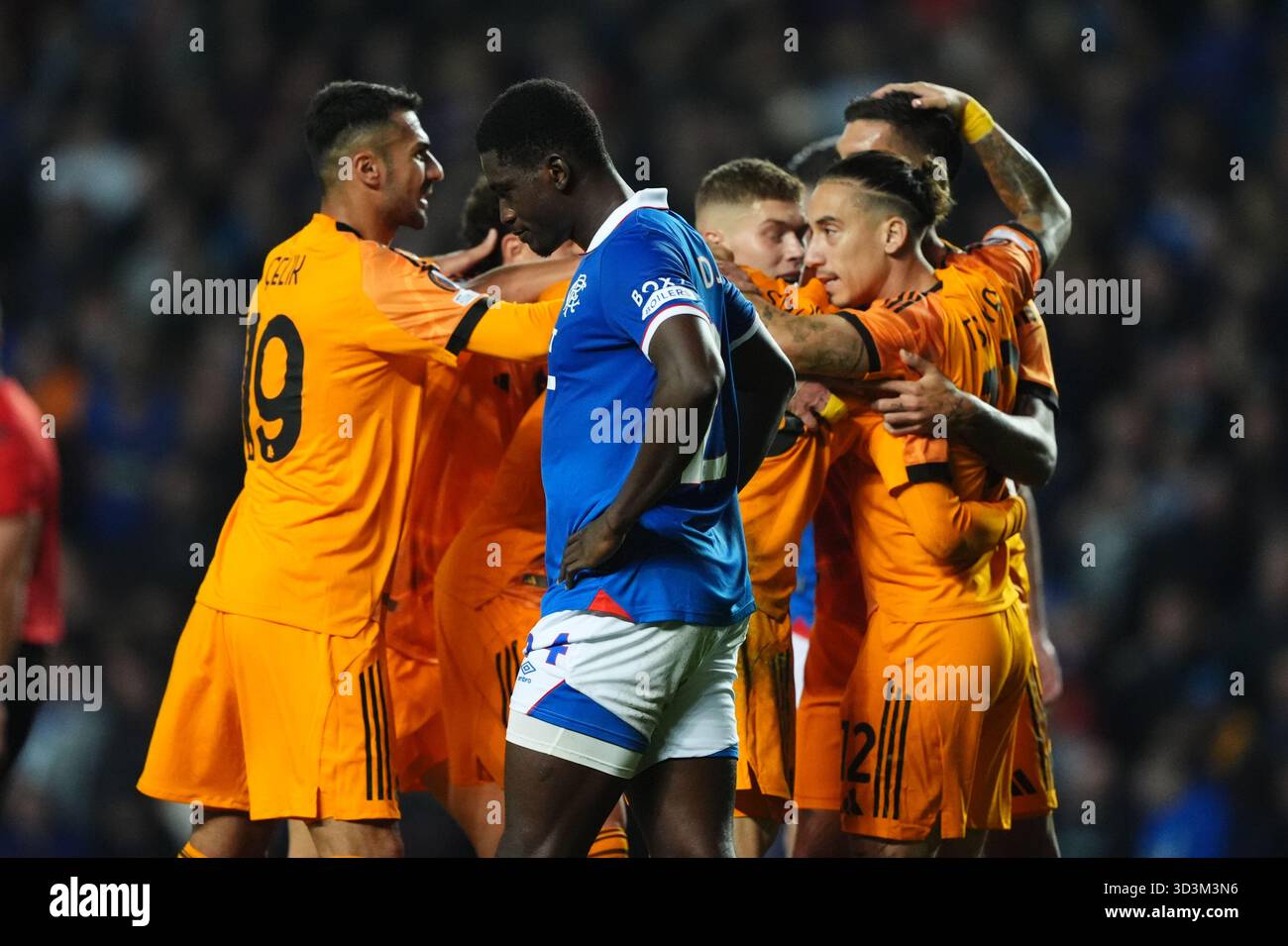 Rangers' Nasser Djiga appears dejected after conceding a second goal ...