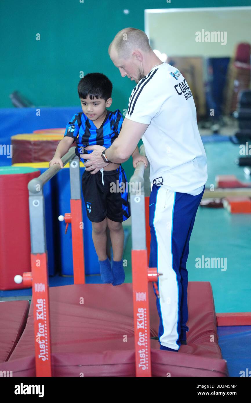 Young gymnasts training at Premier Gymnastics academy in Qatar. They ...
