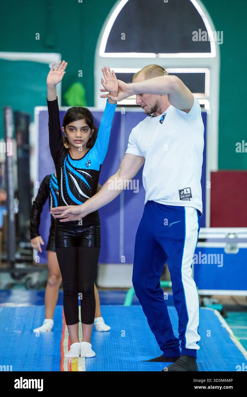 Young gymnasts training at Premier Gymnastics academy in Qatar. They ...