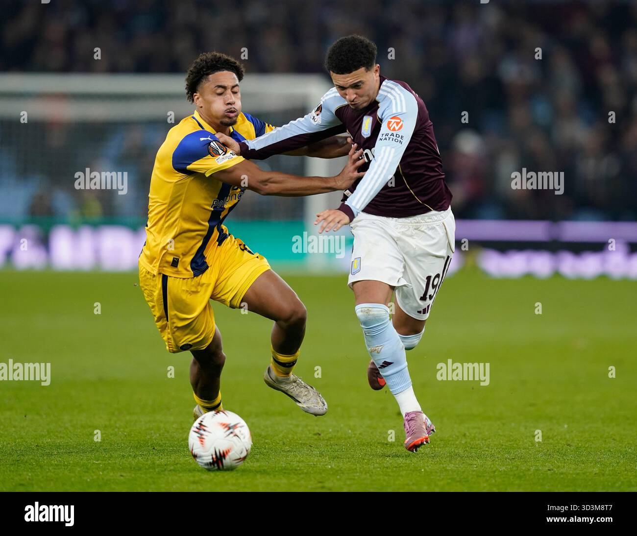 Birmingham, England, 6th November 2025. Tyrese Asante of Maccabi Tel-Aviv tackles Jadon Sancho ...