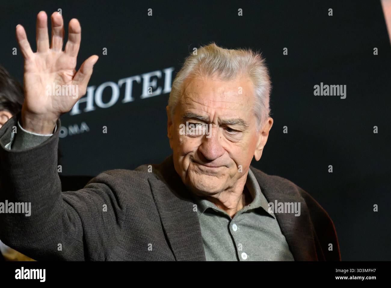 Actor Robert De Niro waves as he leaves the opening of the Nobu hotel ...