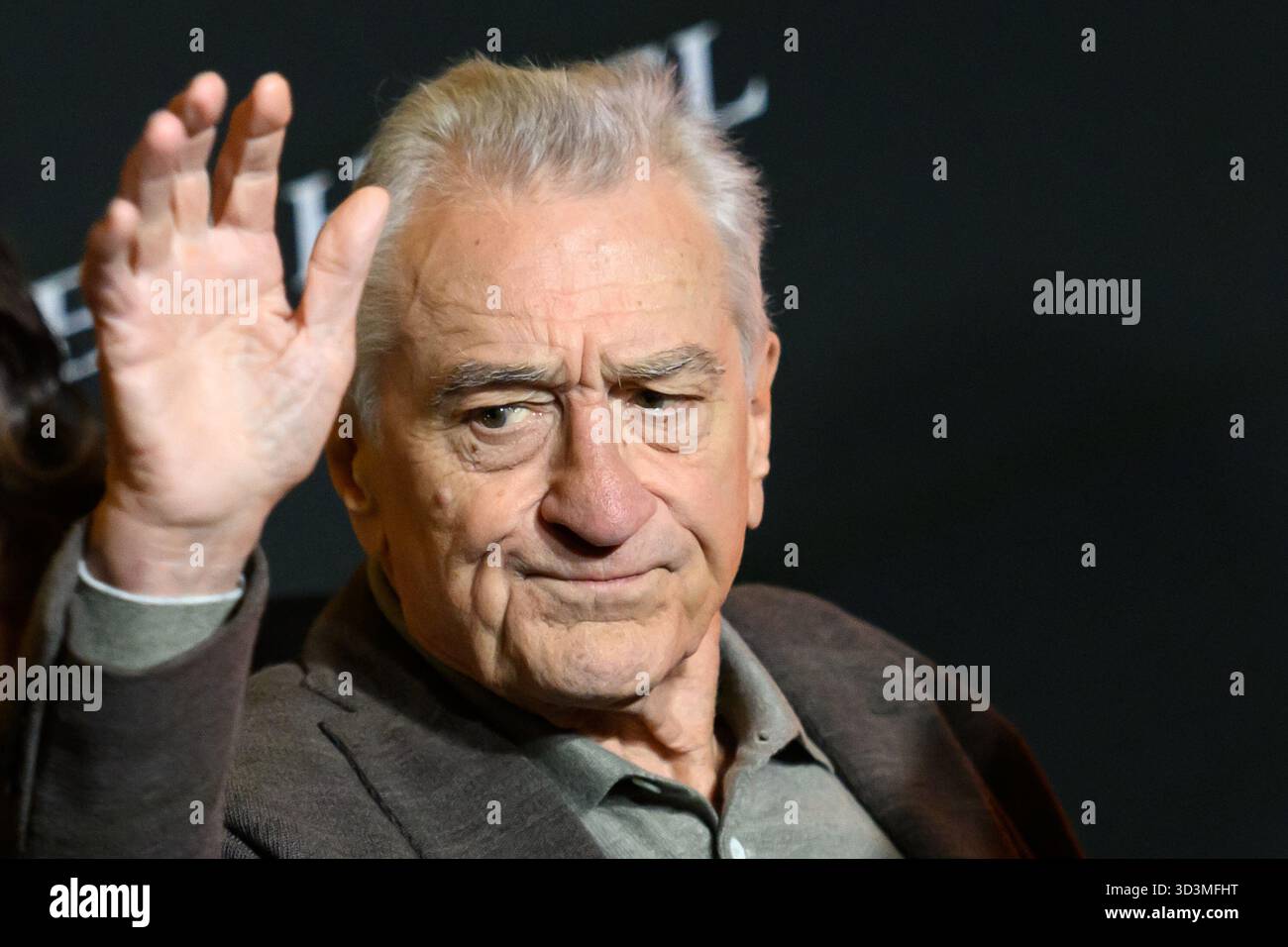 Actor Robert De Niro waves as he leaves the opening of the Nobu hotel ...