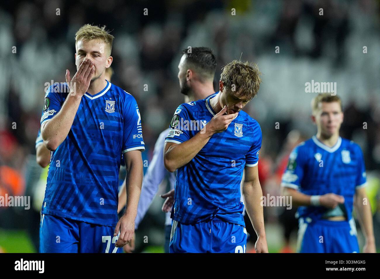 KKS Lech Poznan's Mateusz Skrzypczak (l) and Robert Gumny dejected ...