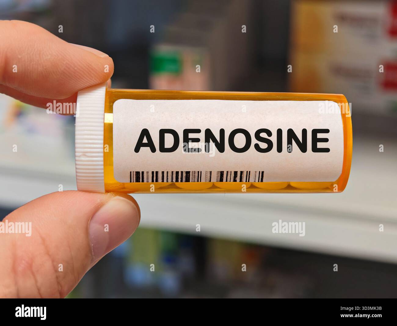 orange plastic Box of ADENOSINE tablets on a hospital pharmacy table ...