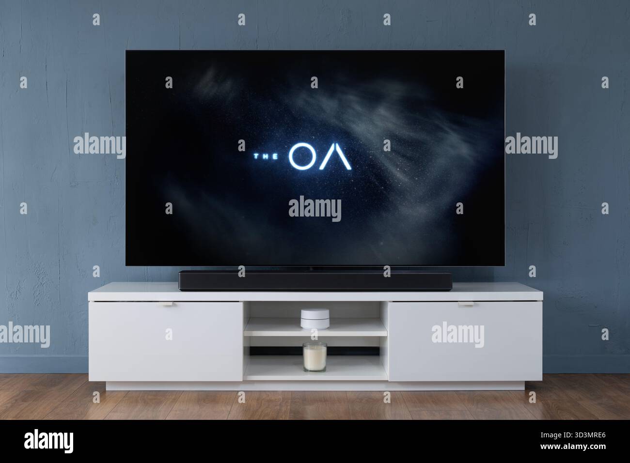 A widescreen OLED television showing the intro scene to the TV series ...