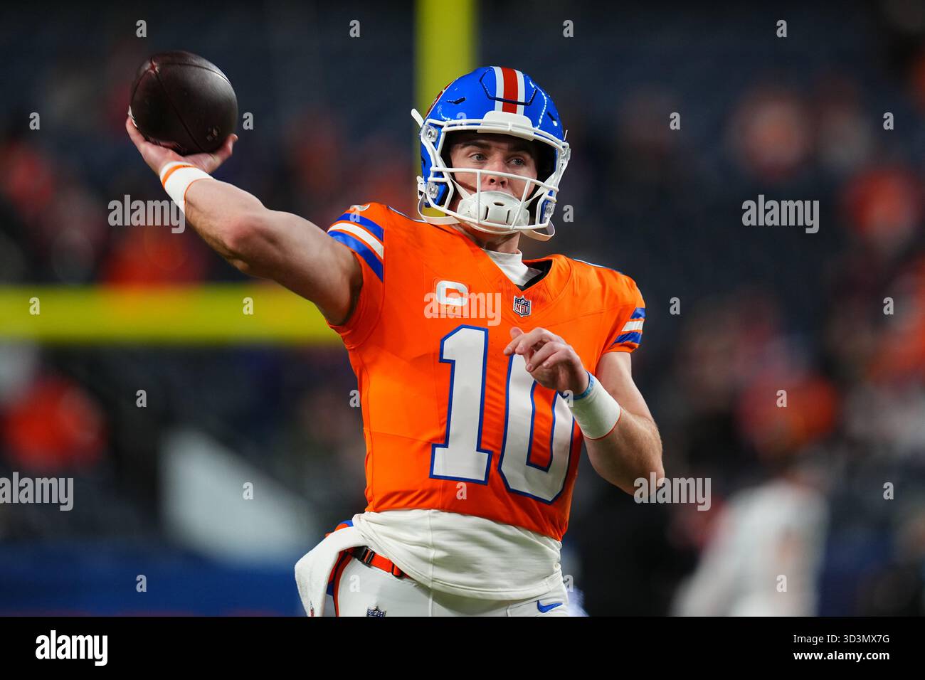 Denver Broncos quarterback Bo Nix warms up before an NFL football game ...