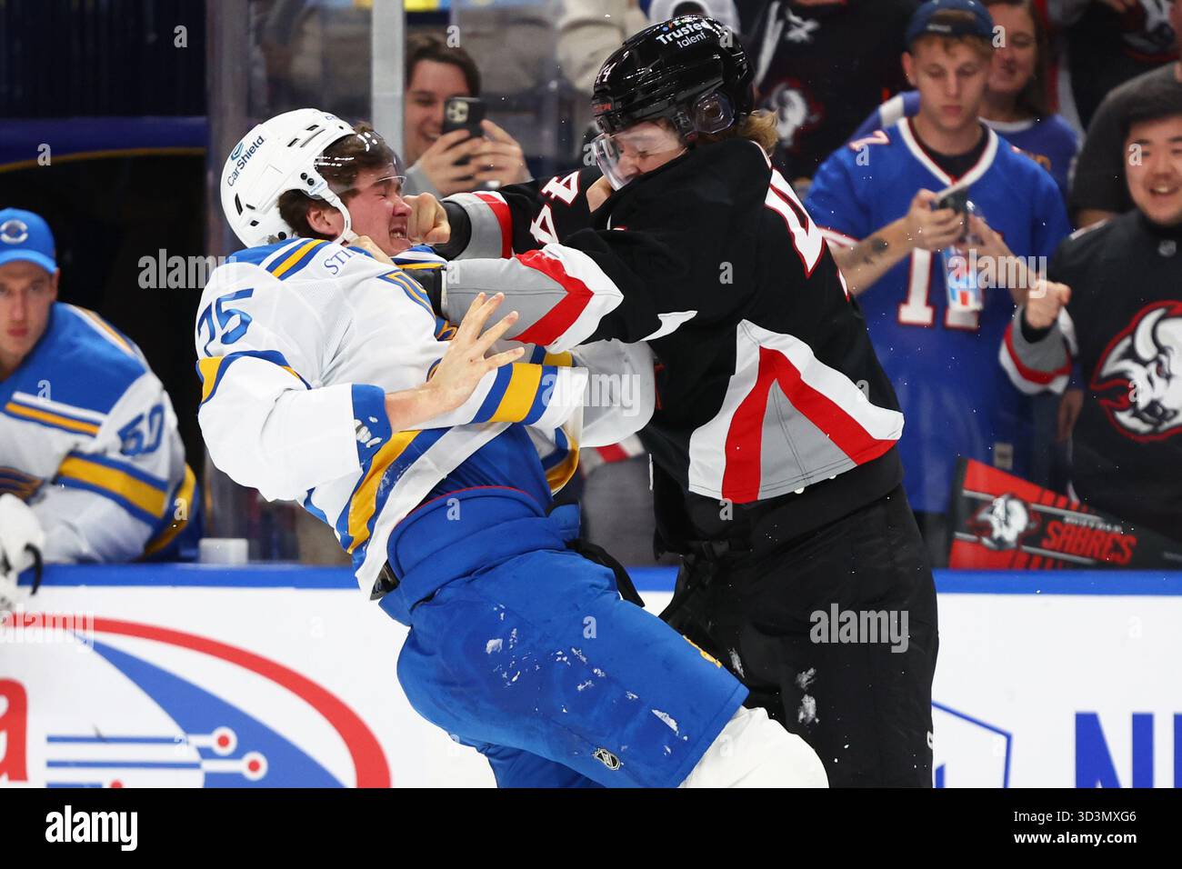 St. Louis Blues defenseman Tyler Tucker (75) and Buffalo Sabres center ...