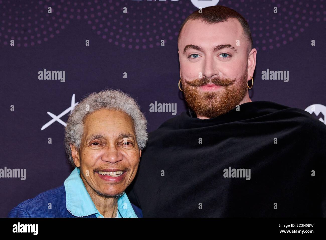 Beverly Glenn-Copeland (left) and Sam Smith walk the red carpet at the ...