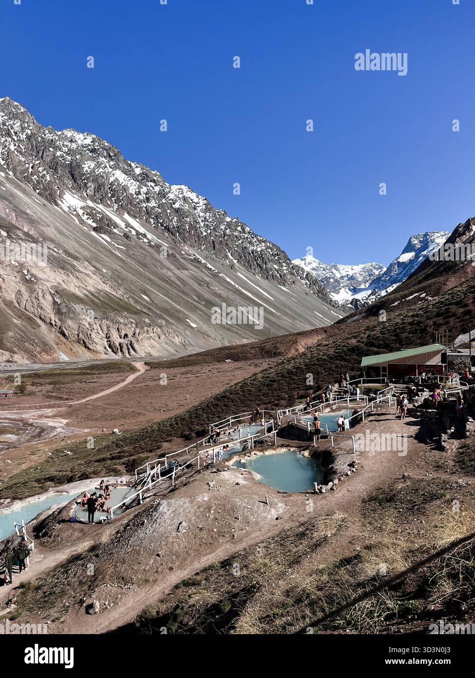 Visitors relaxing in the natural thermal pools of Termas de Colina in ...