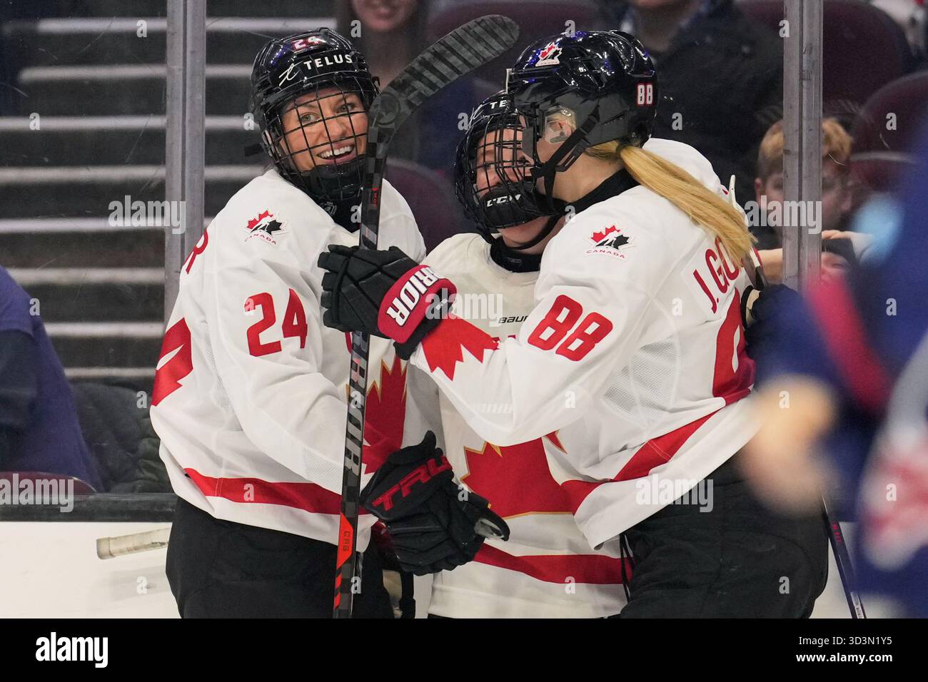 Canada's Natalie Spooner (24) and Julia Gosling (88) celebrate a goal ...