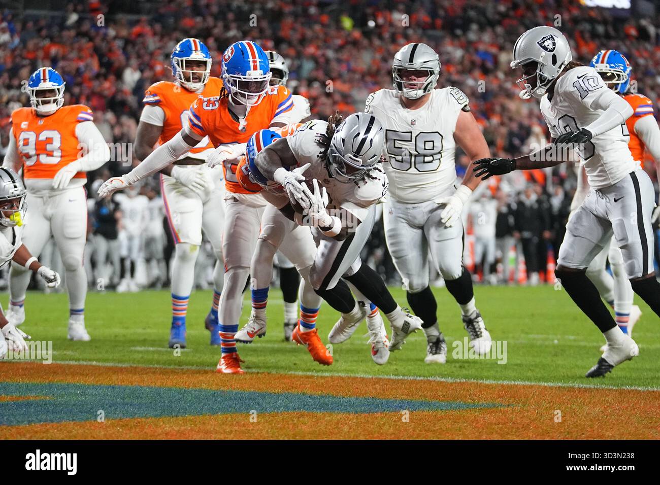 Las Vegas Raiders running back Ashton Jeanty (2) scores in the first ...