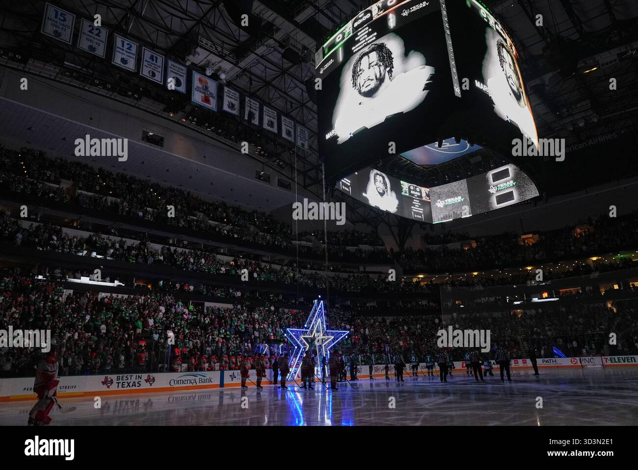 The Dallas Stars, Anaheim Ducks and fans observe a moment of silence in ...
