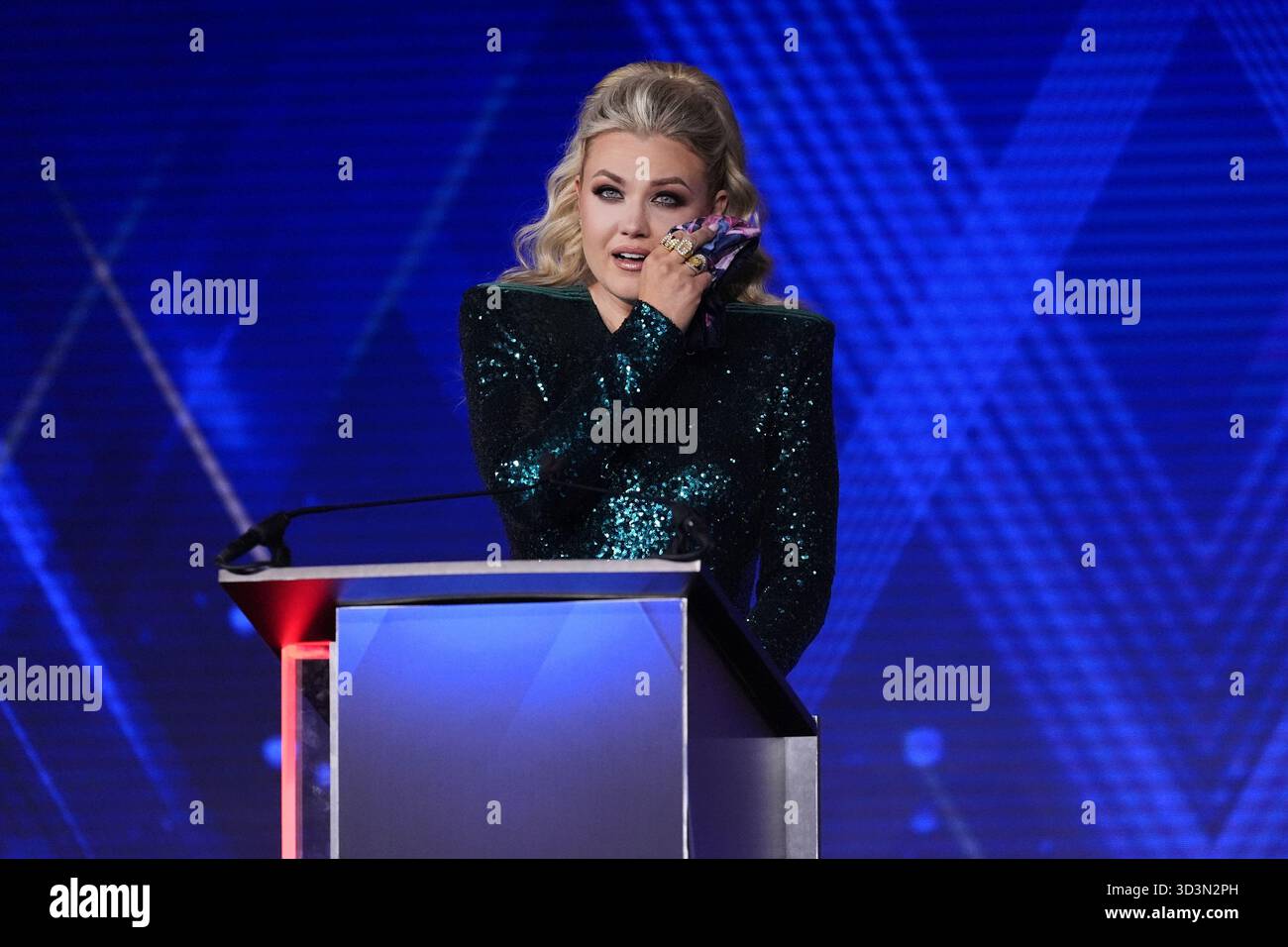 Erika Kirk reacts after she receives the Charlie Kirk Legacy Award during the FOX Nation Patriot ...