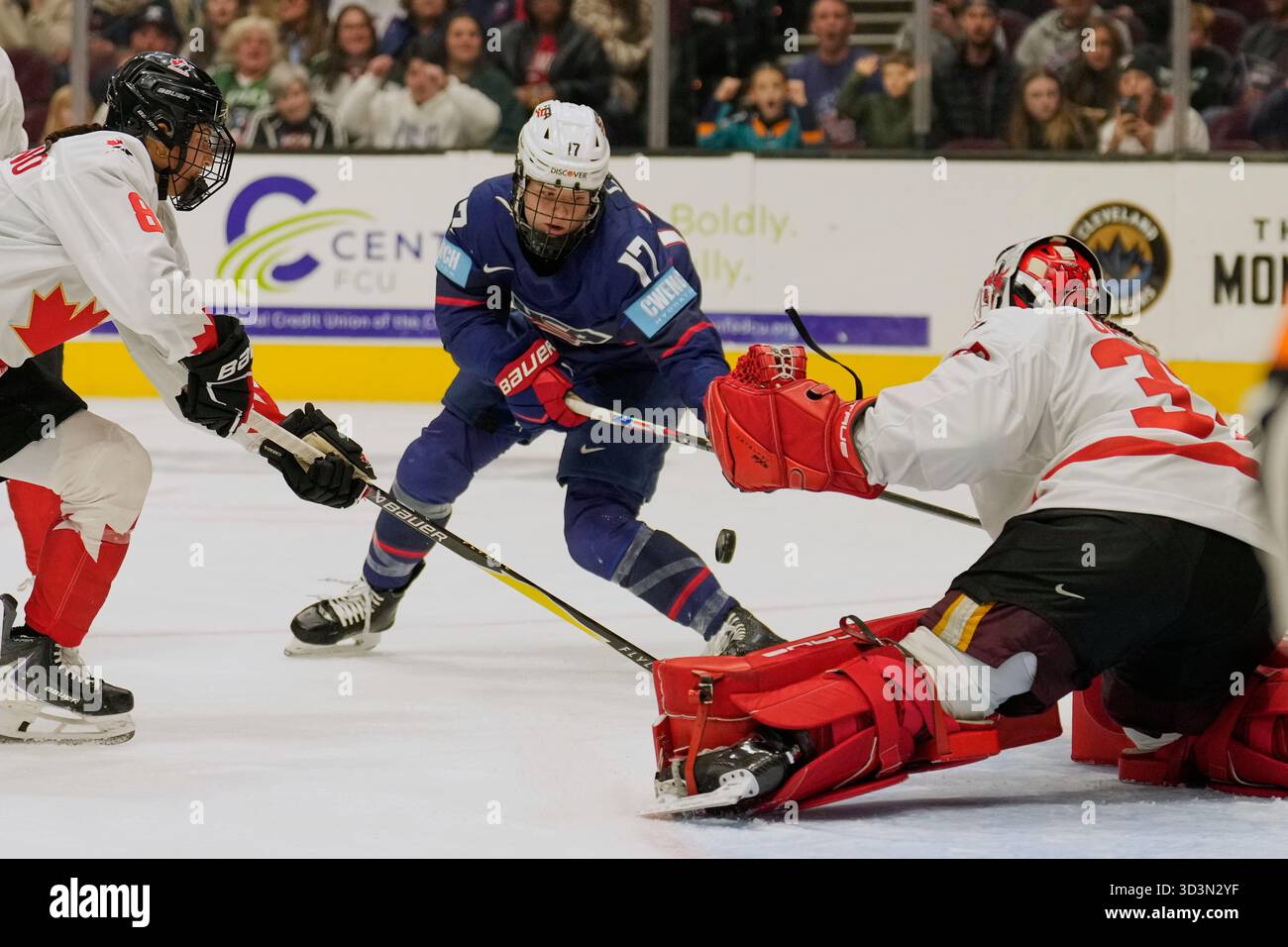 US forward Britta Curl-Salemme (17) shoots on Canada goaltender Eve ...