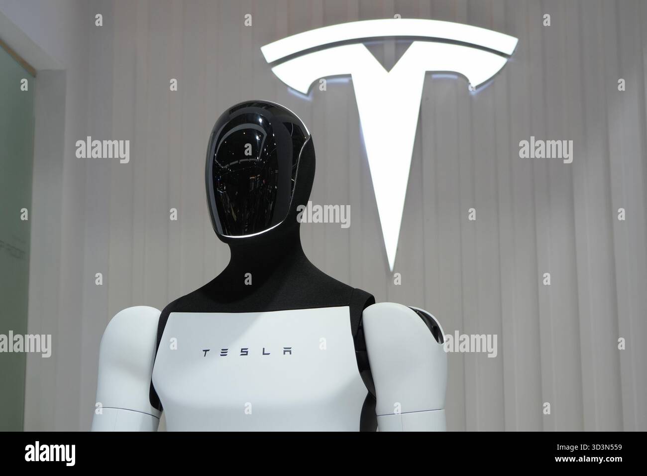 SHANGHAI, CHINA - NOVEMBER 6, 2025 - An Optimus humanoid robot ...